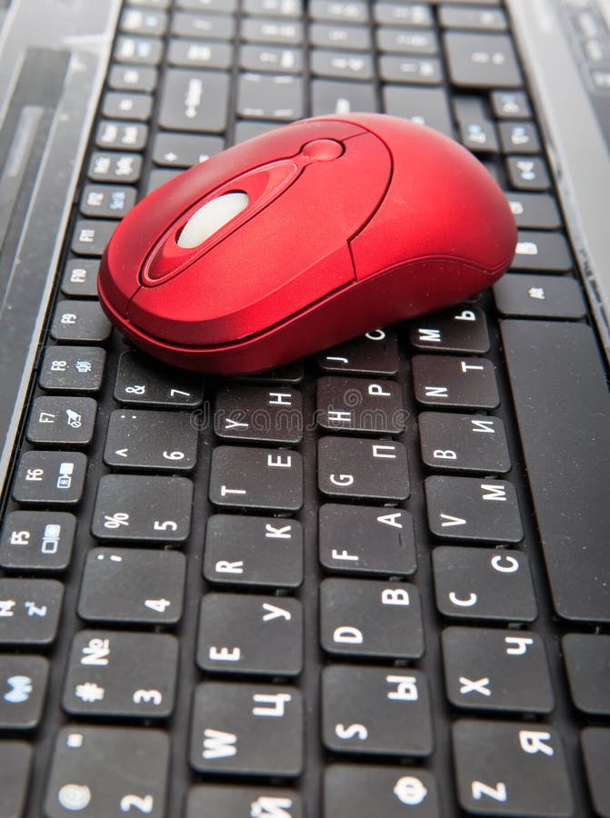 The Red Computer Mouse on the Black Keyboard Stock Image - Image of ...