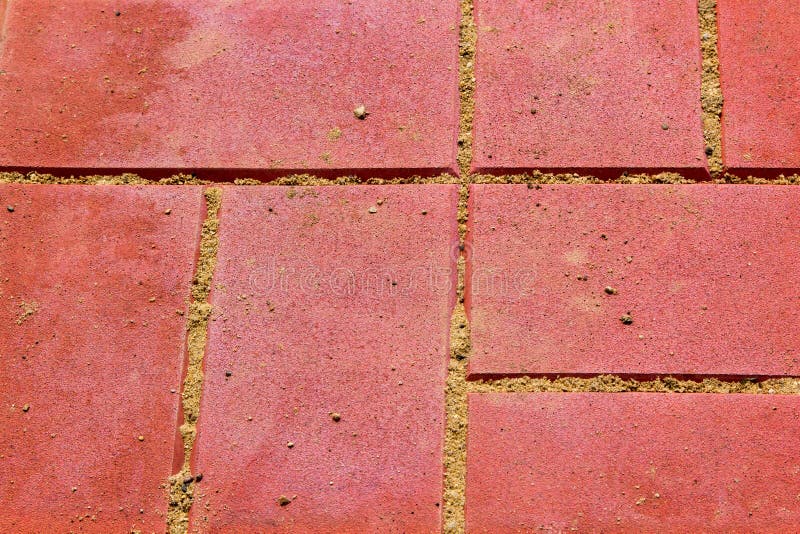 Red Concrete Paving Slabs with Sand Closeup Stock Image - Image of ...