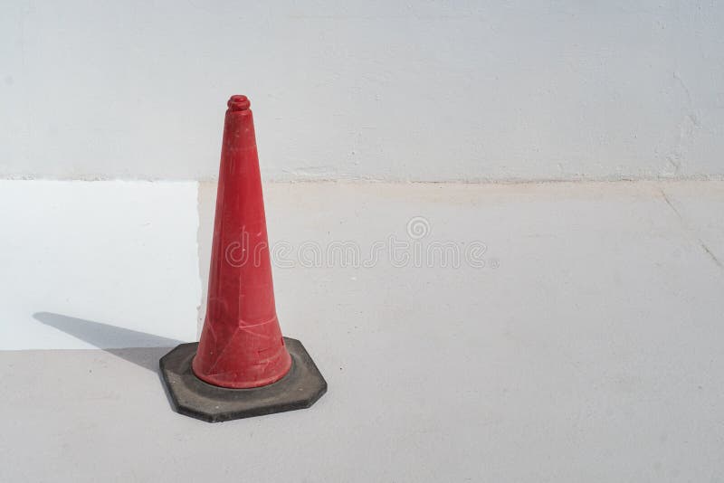 Red Cone on the White Wall Background Stock Photo - Image of attention ...