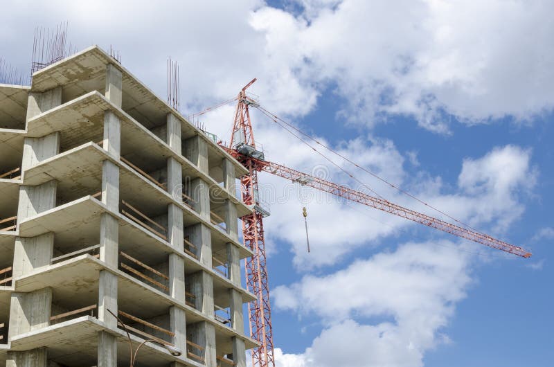 Construction Crane and Frame of a Building Against the Sky. Stock Image ...