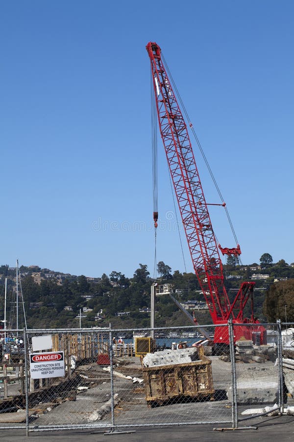 Red Construction Crane at Water Side Lifting Stock Photo - Image of ...