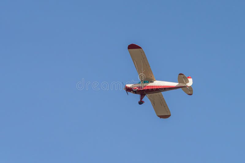 A Red Corn Plane Flies Over the Fields Stock Photo - Image of view ...
