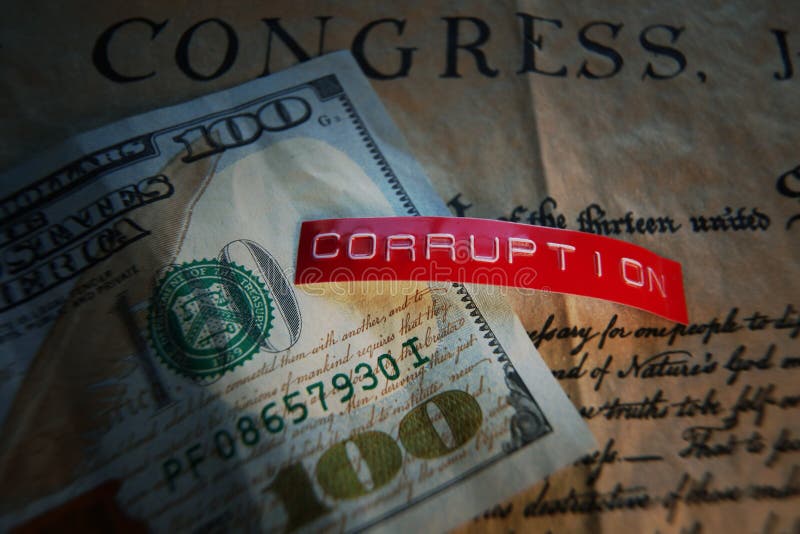 Red Corruption Label on a Hundred Dollar Bill and US Constitution Stock ...