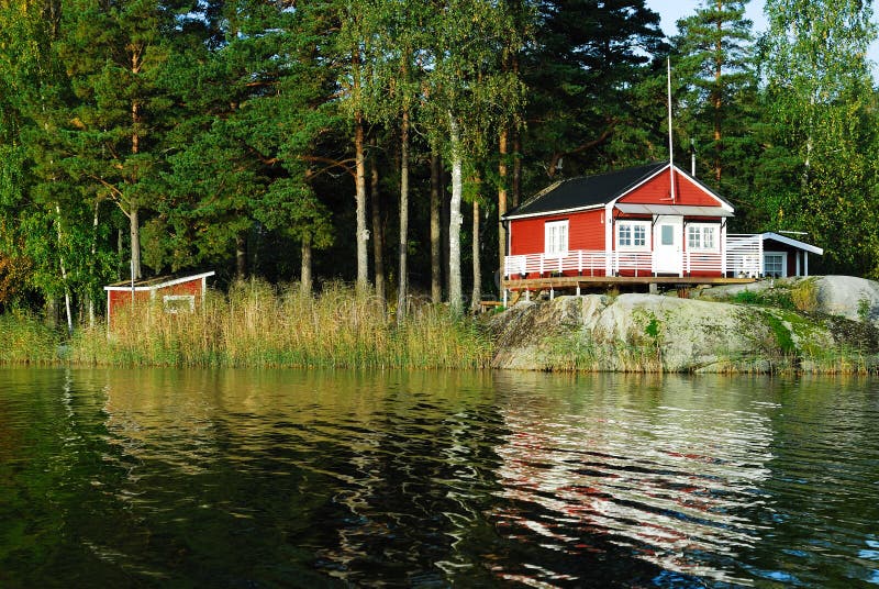 Red cottage by lake stock photo. Image of cottage, travel - 30708024