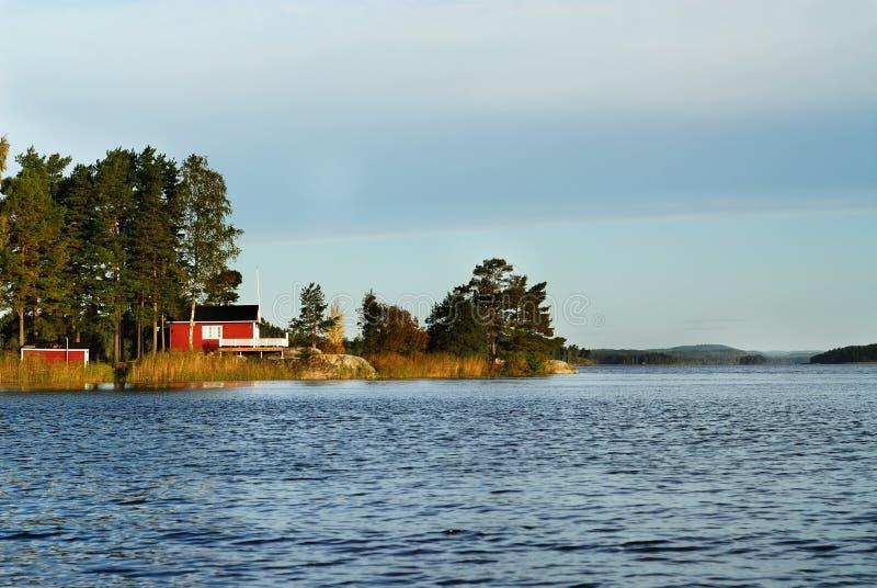 Red cottage by lake stock photo. Image of cottage, travel - 30708024