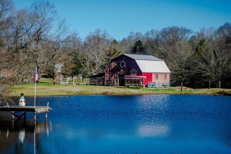 Red Country Barn by the Pond Stock Image - Image of field, meadow: 66710285