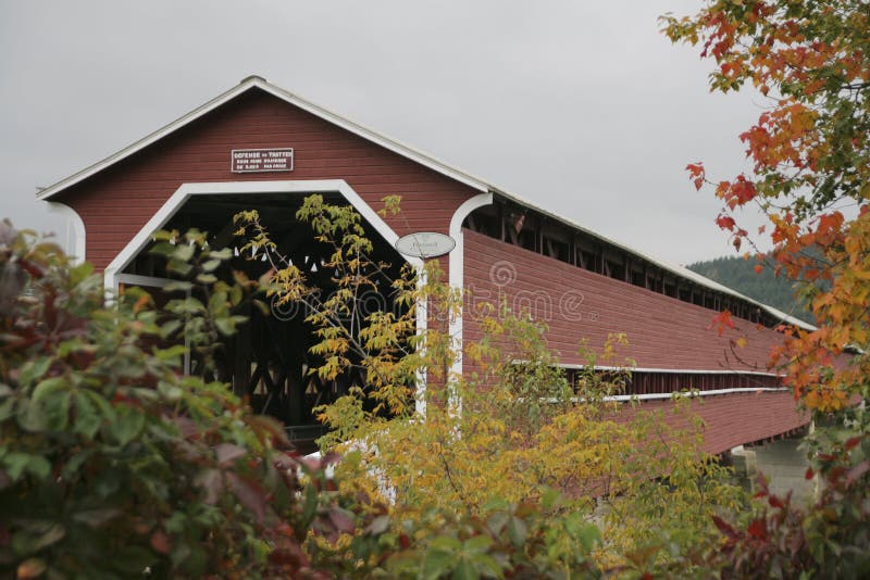 Red covered bridge stock image. Image of river, country - 93833357