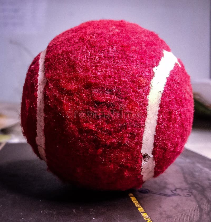 Red Cricket ball closeup stock photo. Image of orange - 221068322