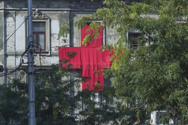 Red cross on the building editorial image. Image of facade - 196586235