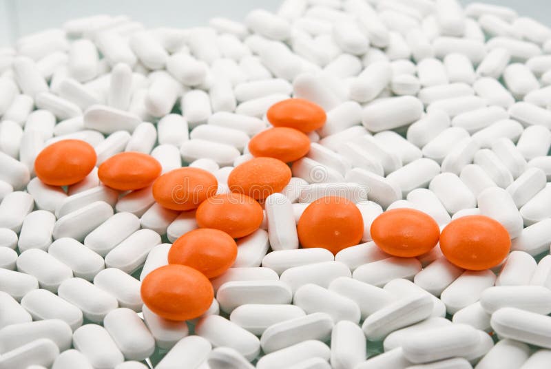 Orange Pills Cross Close-up Stock Image - Image of healthcare, drugs ...
