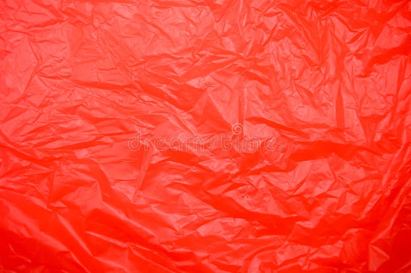 Red Crumpled Plastic Surface with a Shiny Texture and a Myriad of Folds ...