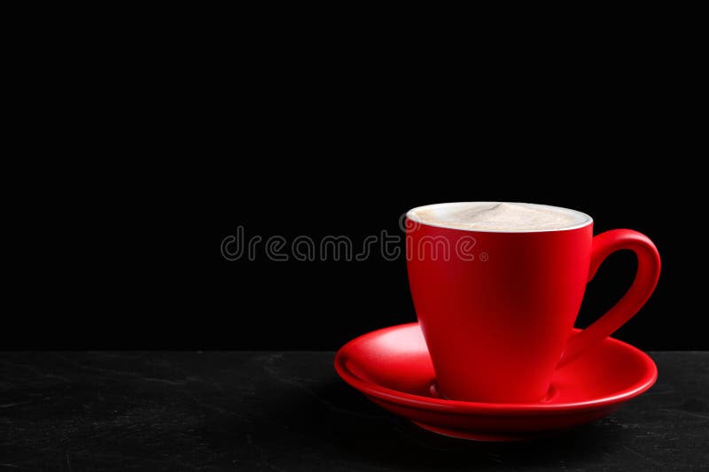Red Cup with Aromatic Cappuccino on Black Textured Table. Space for ...