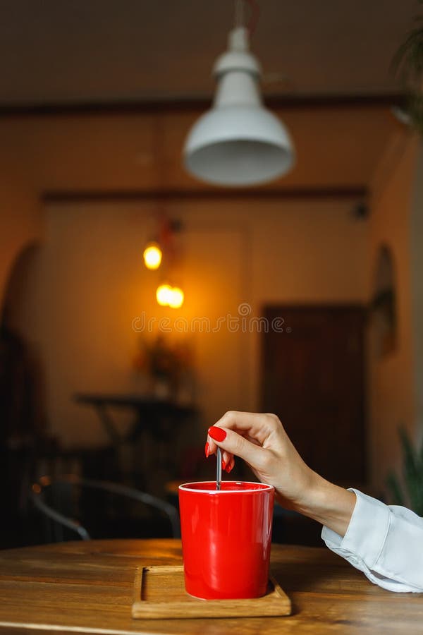 Red Cup of Coffee in a Cafe on Table. Place for Rest Stock Image ...