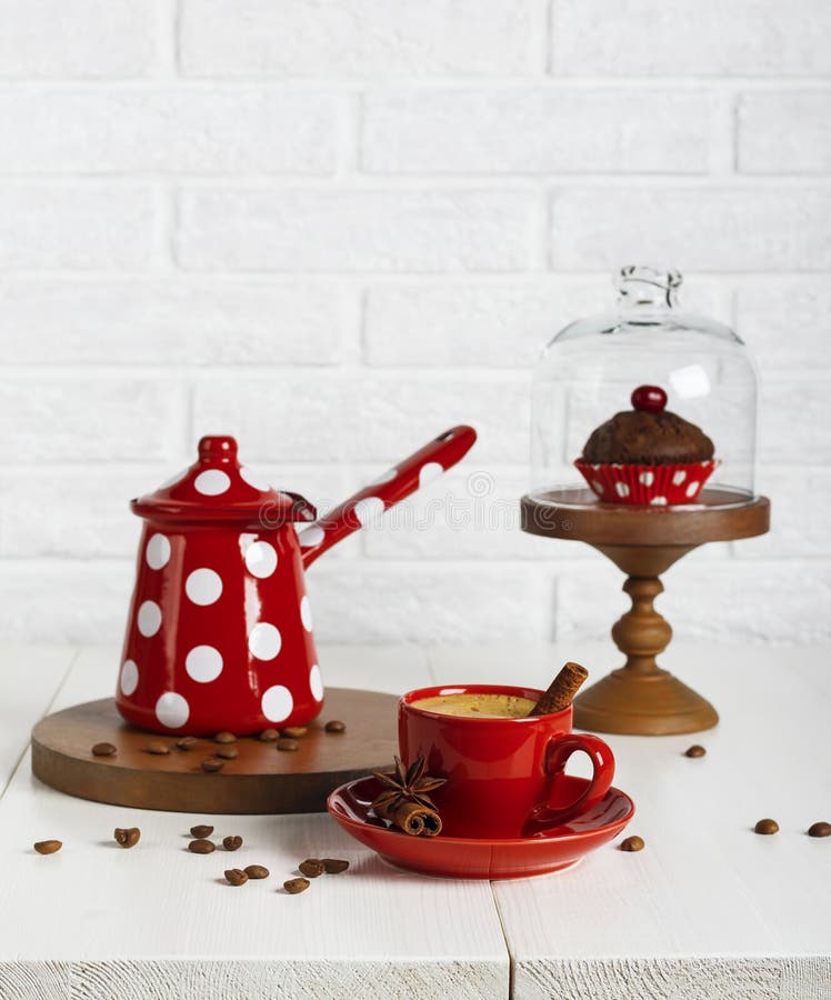 Red Cup of Coffee and Coffee Pot on the Table Stock Image - Image of ...