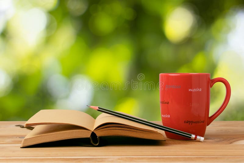 Red Cup of Coffee and a Note Book, Notepad on a Wooden Table Wit Stock ...