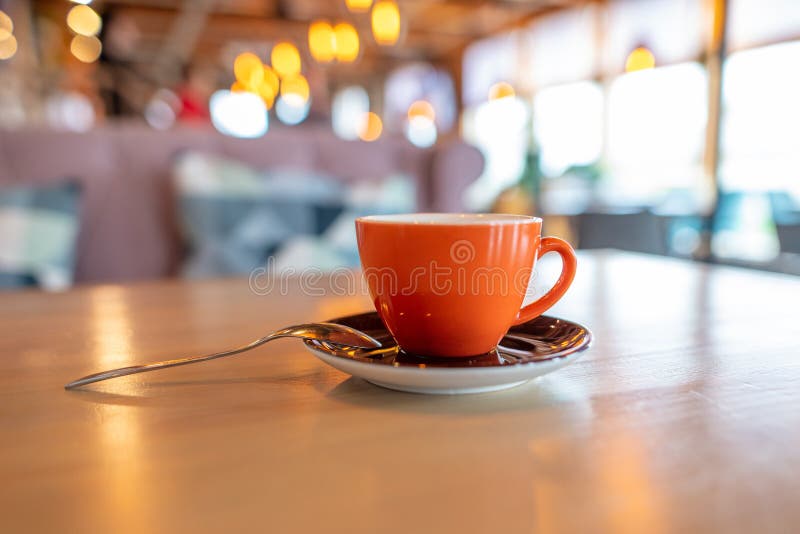 Red Cup of Coffee on a Table in a Cafe. Stock Image - Image of beans ...