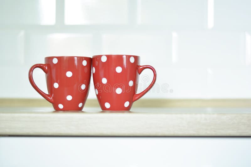 Red Cup with Dots on Kitchen Table Stock Photo - Image of white, color ...