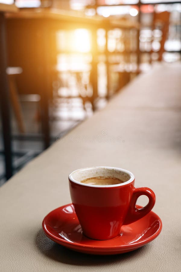 Red Cup Espresso on Leather Seat in Coffee Cafe. Stock Image - Image of ...