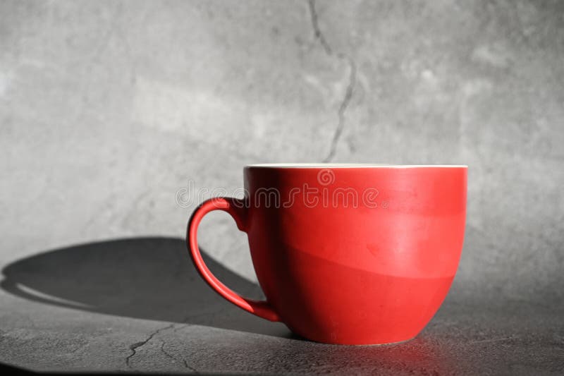 Red Cup with a Shadow. Long Shadow from a Cup of Coffee Stock Image ...