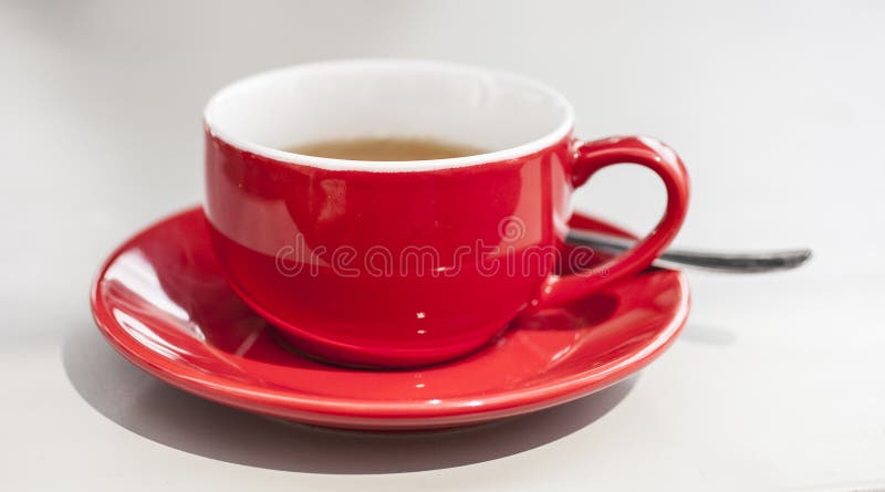 A red cup of tea. stock image. Image of bright, coffeeshop - 95790987