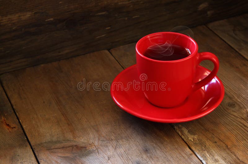 Red Cup of Tea on Wooden Old Table. Retro Filtered Image Stock Image ...