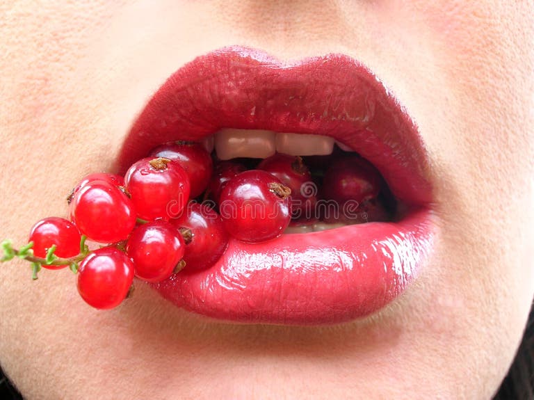 Red currant in the mouth stock photo. Image of face, appetizing - 910742