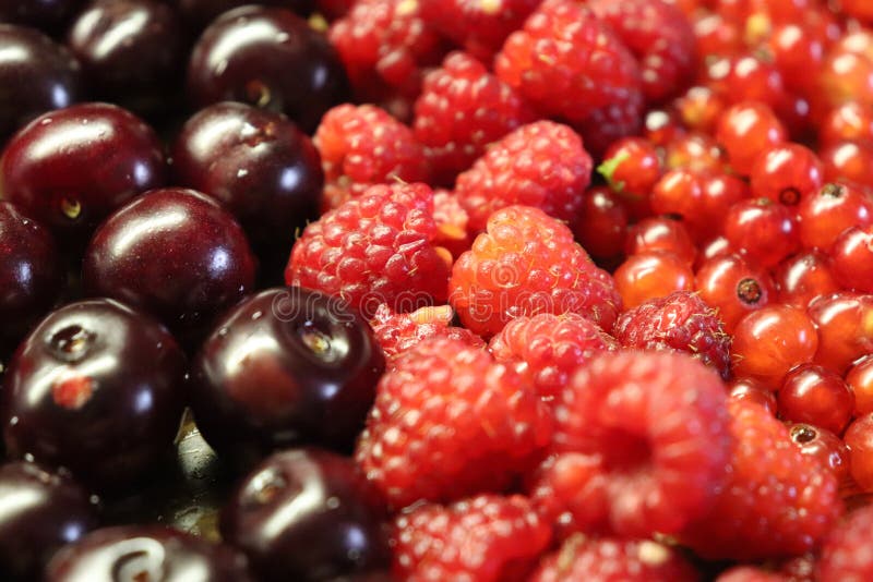 Photo of Cherry, Red Currant and Raspberries on Wooden Table Stock ...