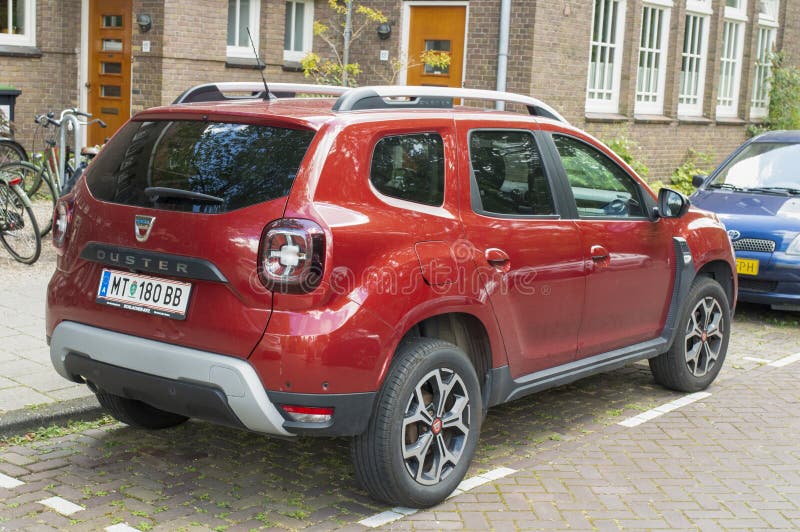 A Red Dacia Duster Car at Amsterdam the Netherlands 9-8-2024 Editorial ...