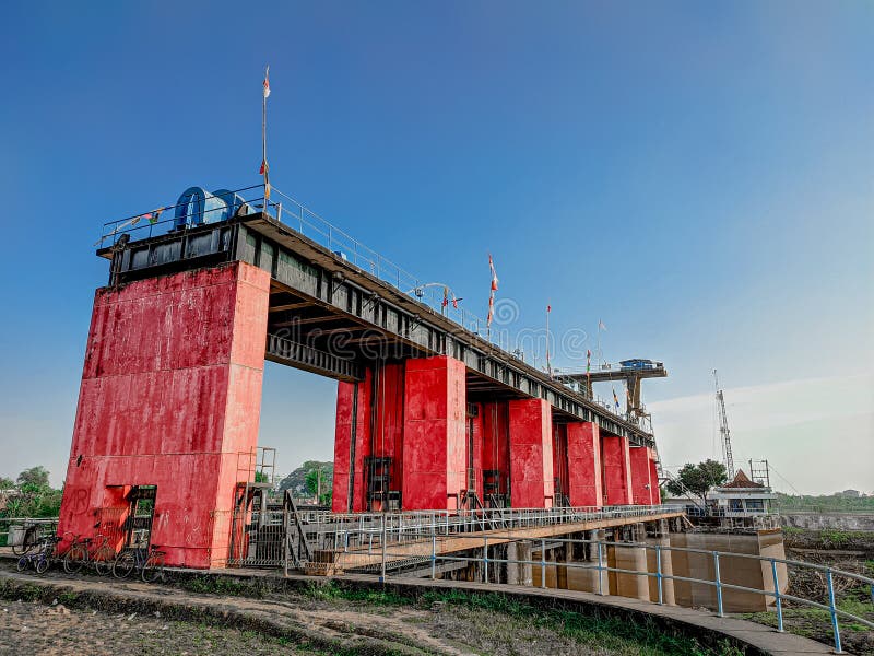 Red dam in the morning stock image. Image of warm, sunset - 262314427