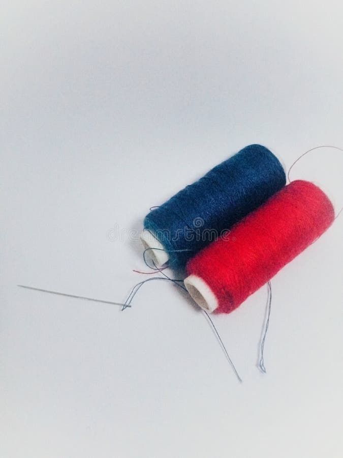 Red and Dark Blue Sewing Needle and Thread Stock Image - Image of ...