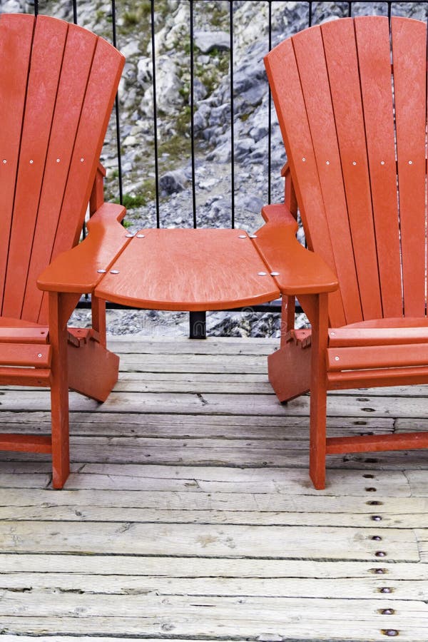 2 Red Deck Chairs on Wooden Walkway in Mountains Stock Photo - Image of ...