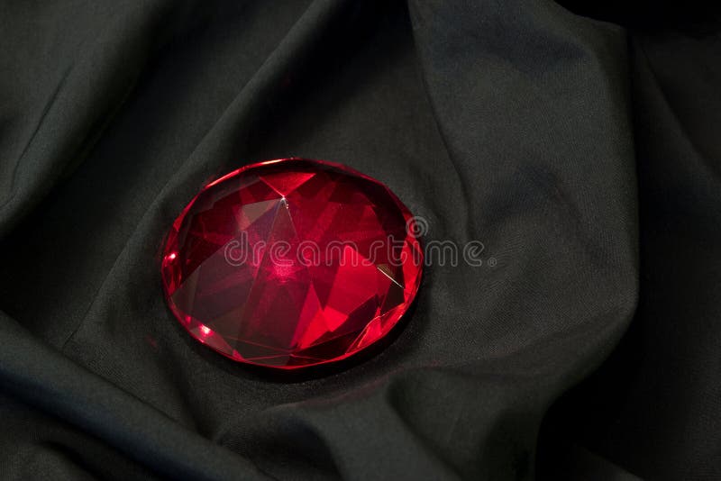 Red diamond on black satin stock photo. Image of rich - 21849660