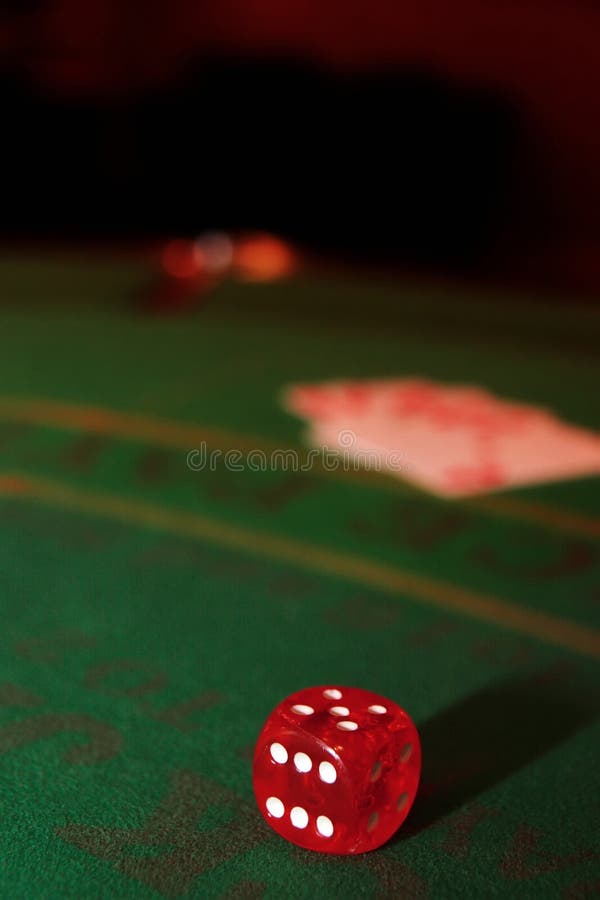 Red dice on casino table stock photo. Image of green - 19162224