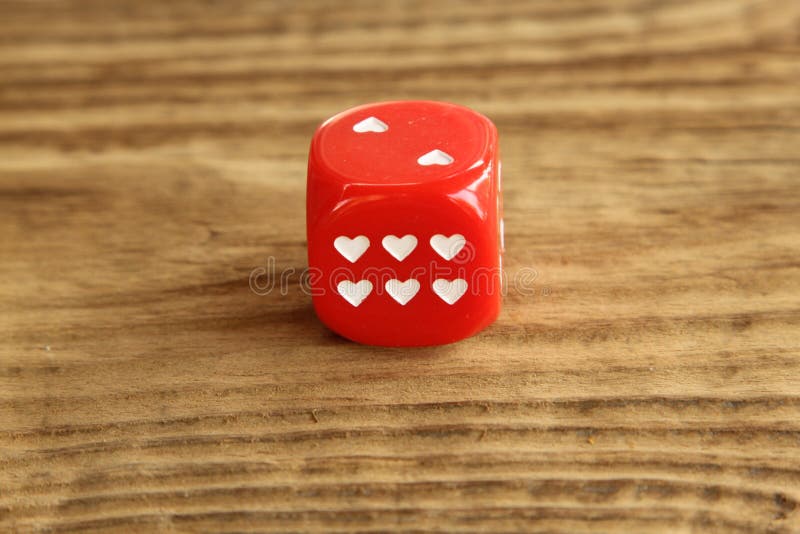 Red Dice / Cube with Hearts on Wooden Background Stock Image - Image of ...