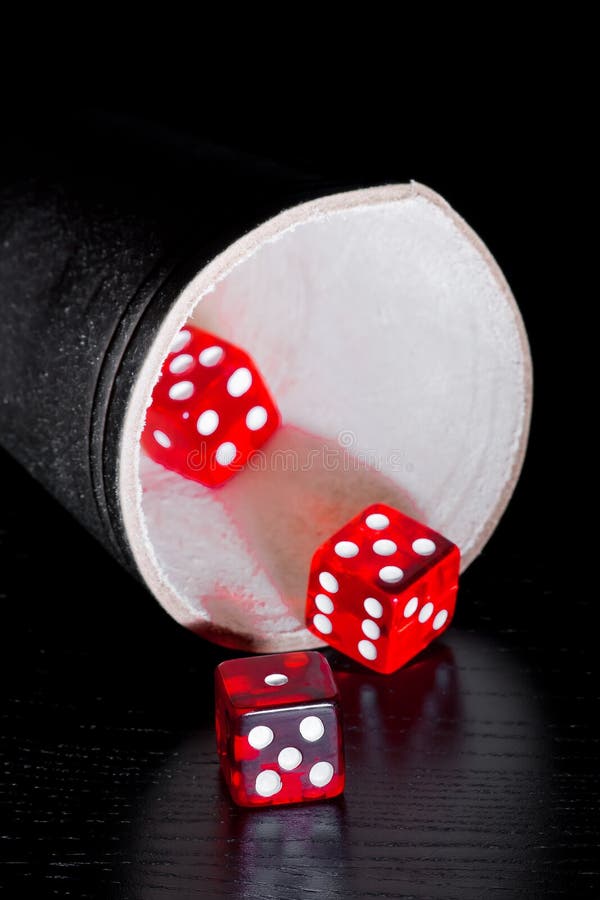 Red Dice on Old Wood Black Table Near a Container Stock Image - Image ...