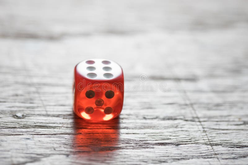 Red Dice on Wooden Table stock photo. Image of gambling - 62685308