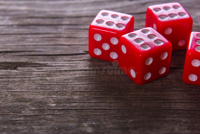 Red dice on a wooden table stock photo. Image of money - 88565236