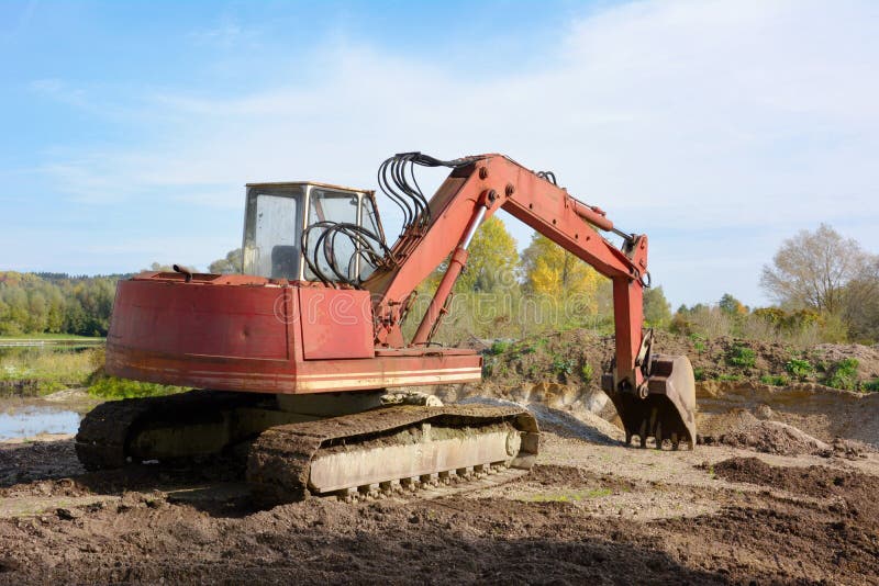Orange hydraulic cylinder stock photo. Image of heavy - 37084958