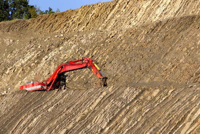 Red digger in stone-pit stock image. Image of marble - 78779893