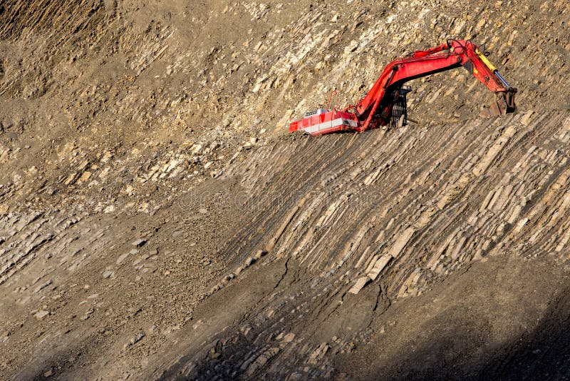 Red digger in stone-pit stock image. Image of industry - 78780009