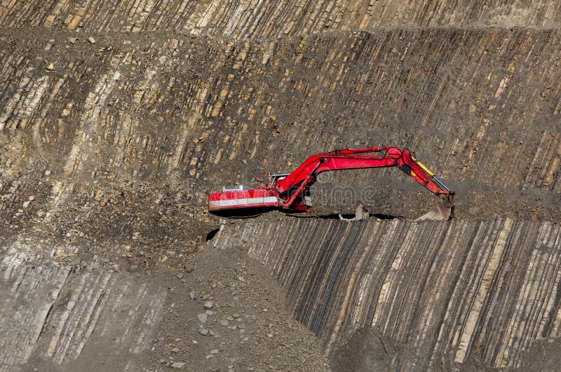 Red digger in stone-pit stock image. Image of loader - 78780055