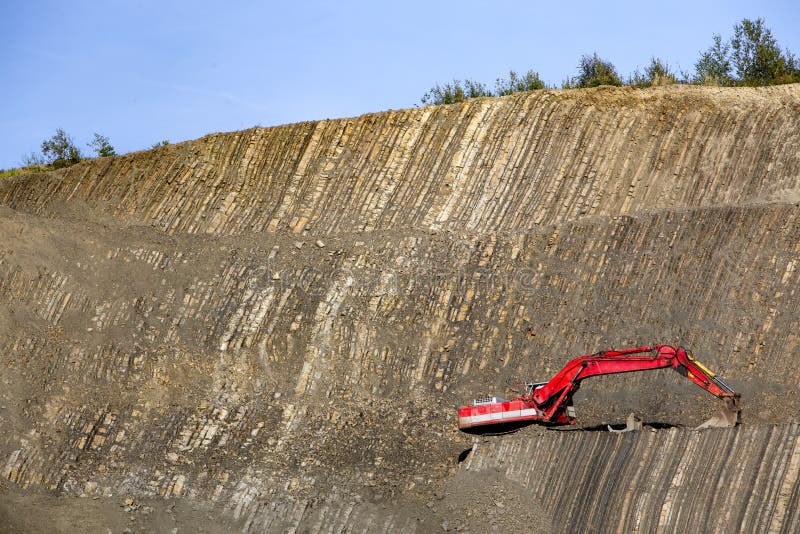 Red digger in stone-pit stock image. Image of excavation - 78780345