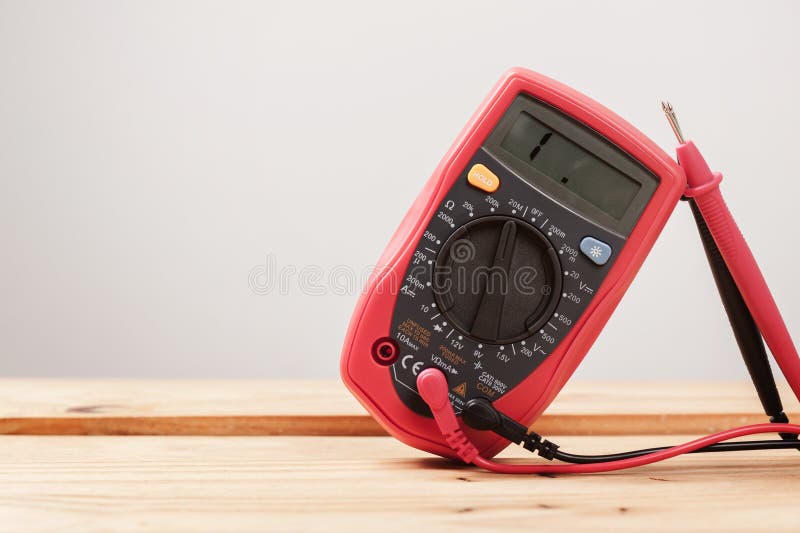 Red digital multimeter stock image. Image of object - 184164661