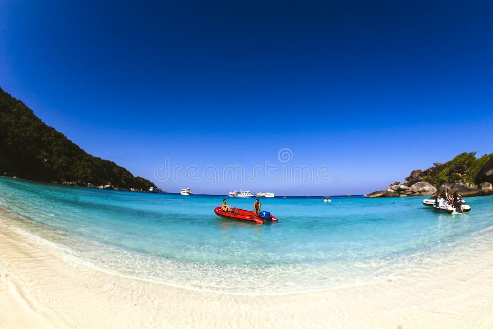Red dingy on beach editorial stock image. Image of people - 28526439