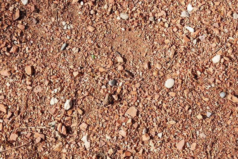 Red Dirt Ground Texture with Small Pebbles Stock Photo - Image of ...