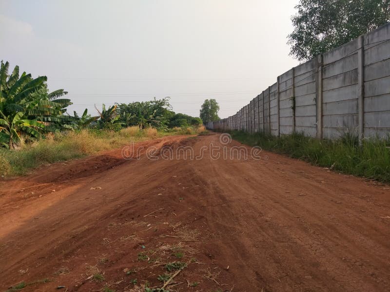 The Red Dirt Road that Becomes the Vehicle Lane Stock Photo - Image of ...