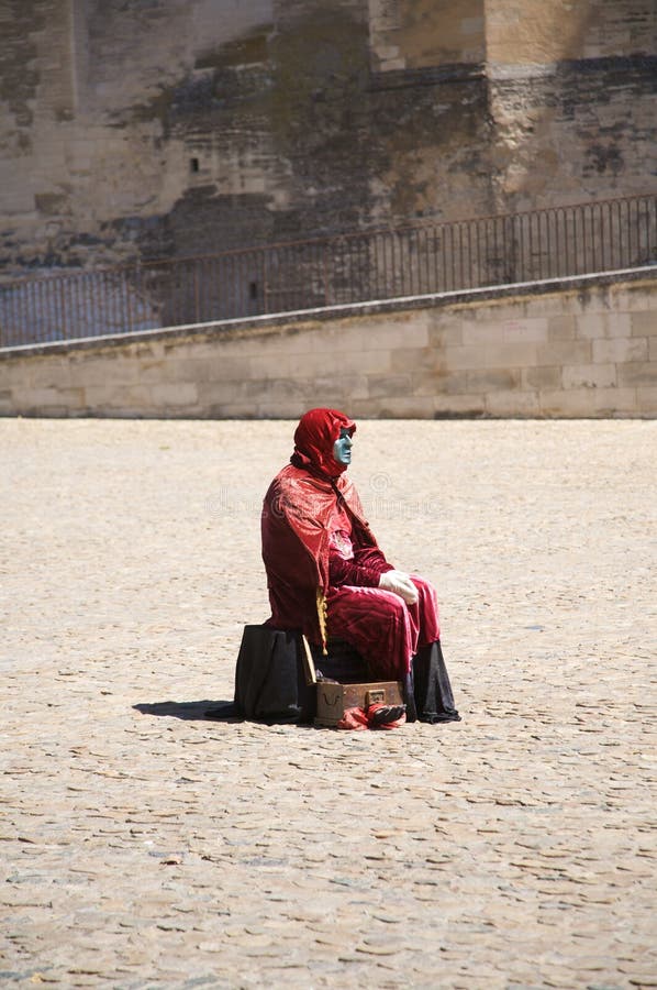 Red disguise man stock image. Image of street, square - 12167987