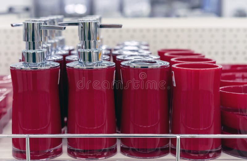 Red Dispensers of Liquid Soap on the Store Shelf Stock Photo - Image of ...