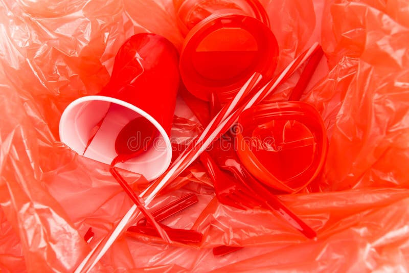 Red Disposable Objects on Plastic Crumpled Stock Photo - Image of ...