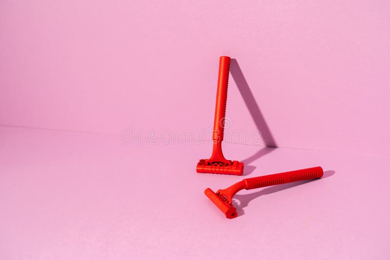 Red Disposable Razor on Pink Background, Copy Space Stock Photo - Image ...